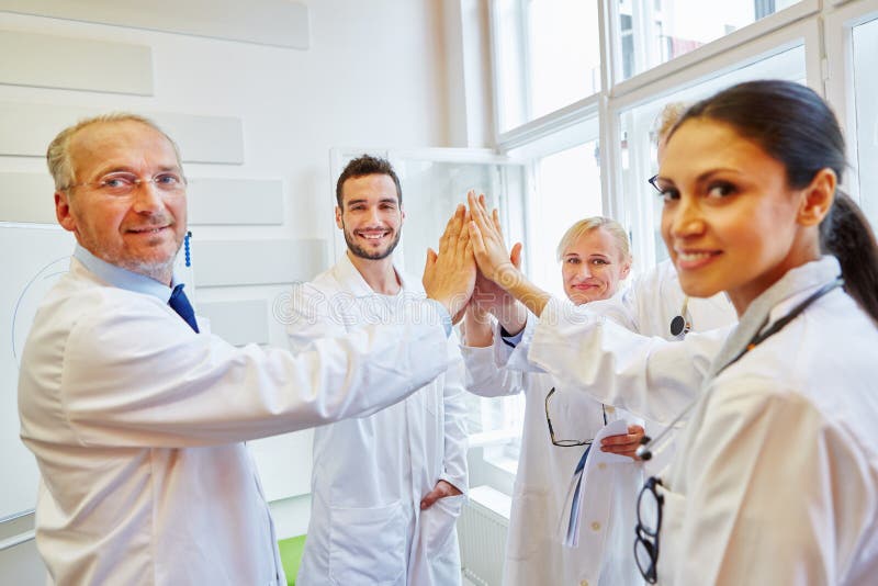 Doctors High Five after Successful Surgery Stock Image - Image of ...