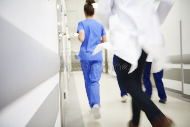 Team of Doctors Running in a Hurry Stock Photo - Image of corridor ...