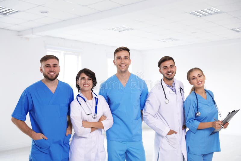 Team of doctors in uniform stock image. Image of medicine - 123605893