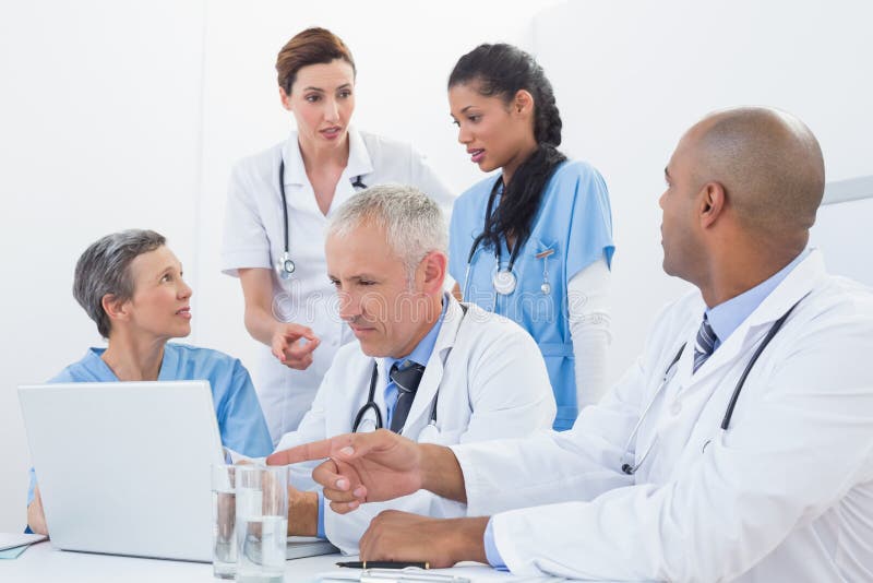 Team of Doctors Working on Laptop Stock Image - Image of care, health ...