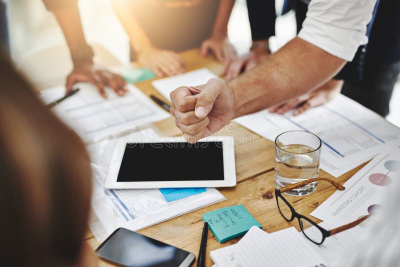 Team Effort is Essential. a Group of Unrecognizable People Working ...