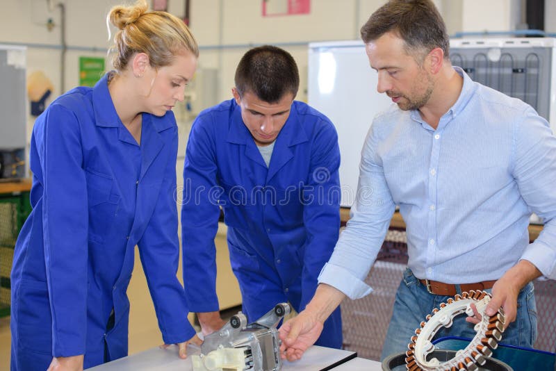 Team of Electronic Engineers Testing a Product Prototype Stock Photo ...