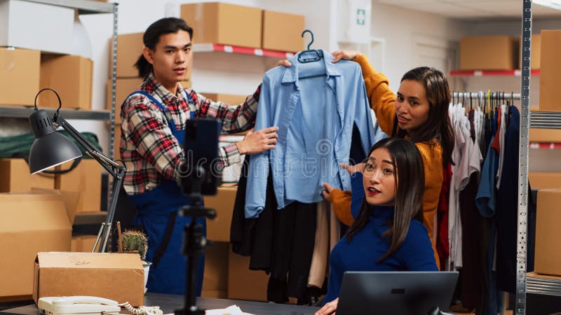 Team of Employees Promoting Retail Store Goods Online Stock Photo ...