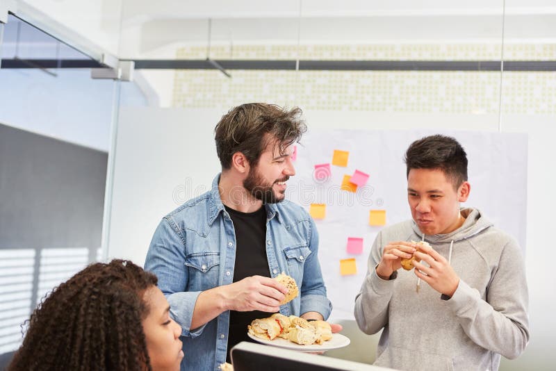 Team Employees Take a Break at a Snack Stock Photo - Image of ...