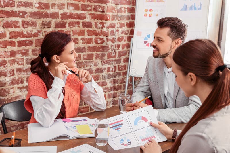 Team of Employees Working Together in Office Stock Image - Image of ...