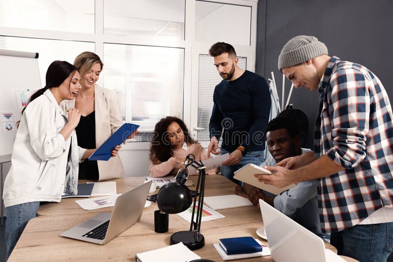 Team of Employees Working Together in Office. Startup Project Stock ...