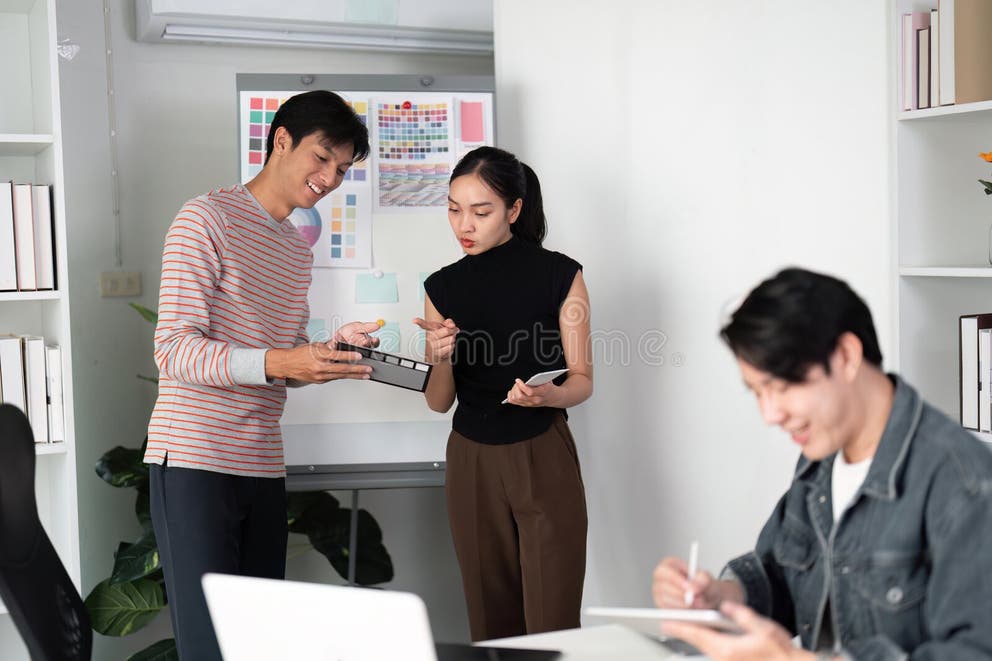 Team Engagement and Color Comparison. Team Members Engaging in a ...