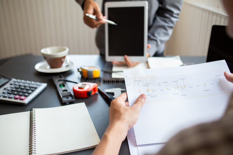 Team Engineer and Architect Present Project Work.blueprint at ...