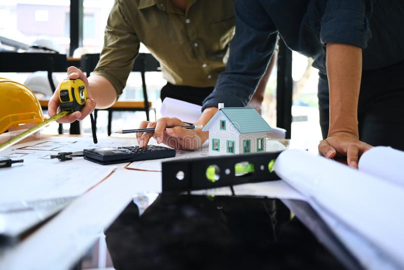 Team of Engineer and Architects Collaborating, Planning Working ...