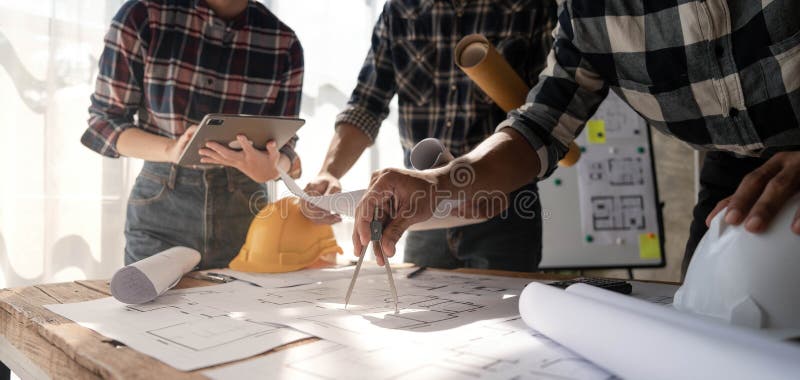 Team of Engineer and Architects Working Join Hands To Build Successful ...