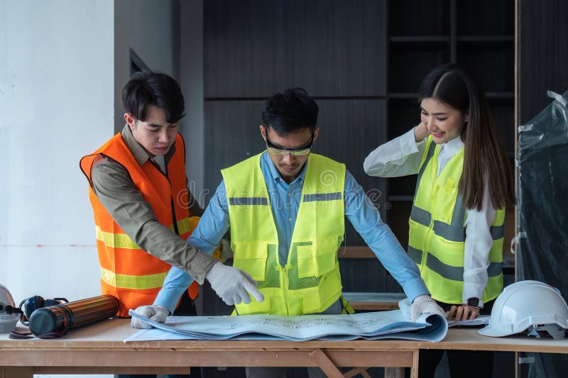 Team of Engineer and Architects Working, Meeting, Discussing, Designing ...