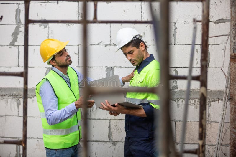 Team Engineer Builder House Construction Using Laptop Check Quality ...