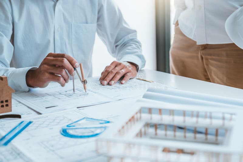 Team Engineer Drawing Graphic Planning and Meeting for Architectural ...