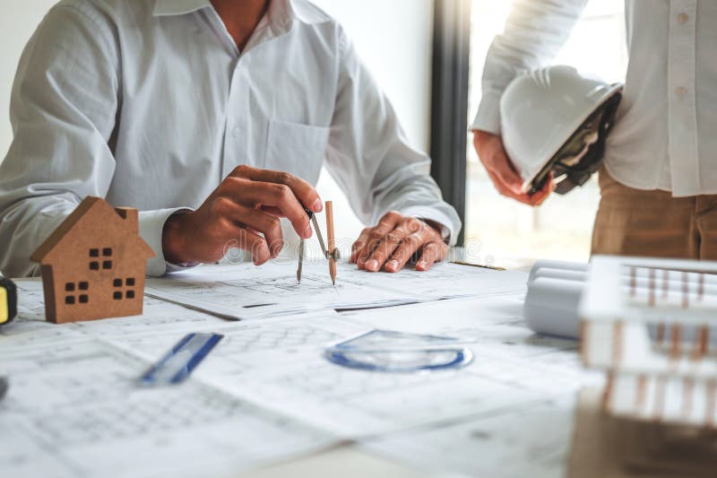 Team Engineer Drawing Graphic Planning and Meeting for Architectural ...