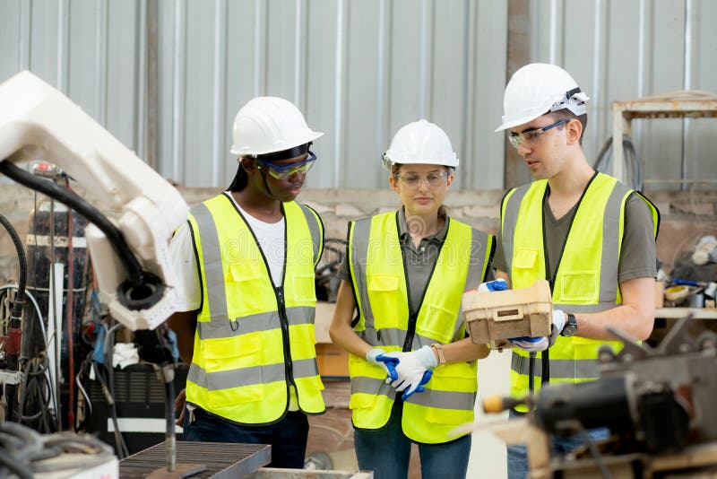 Team Engineer Man and Woman Talking and Explaining about Robot Arms ...
