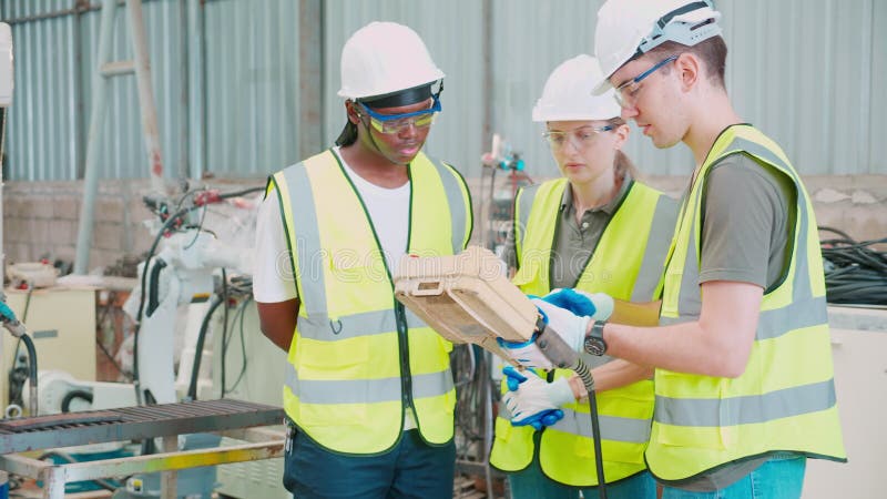 Team Engineer Man and Woman Talking and Explaining about Robot Arms ...