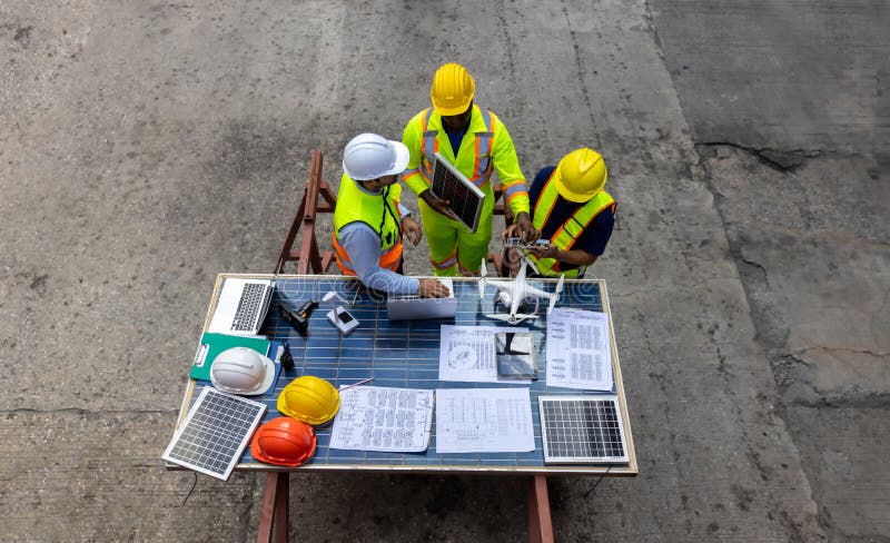 Team Engineer or Team Foreman Meeting and Planning with Document Solar ...