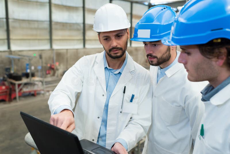 Team Engineering in Workplace Stock Image - Image of architect ...