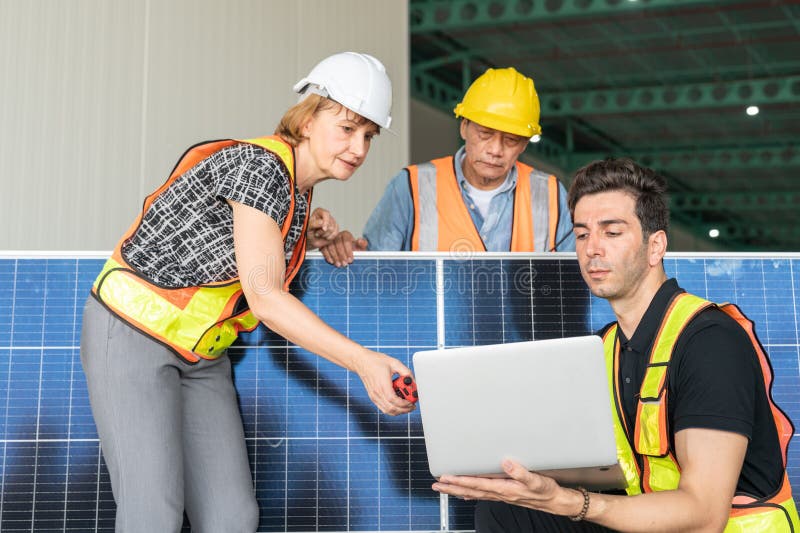 Team of Engineers and Architects Working on a Solar Panel Stock Image ...