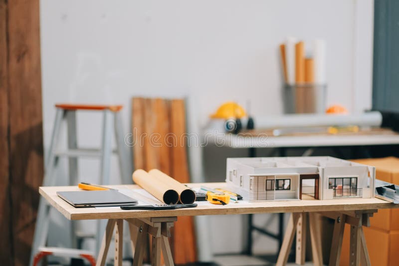 Team Engineers with Draft Plan of Building on Constructing Site ...