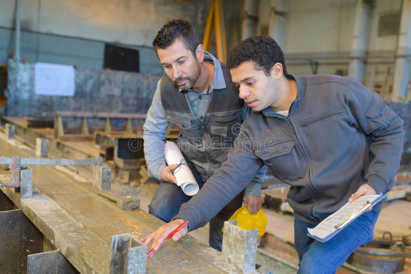 Team Engineers Having Discussion in Factory Stock Photo - Image of ...