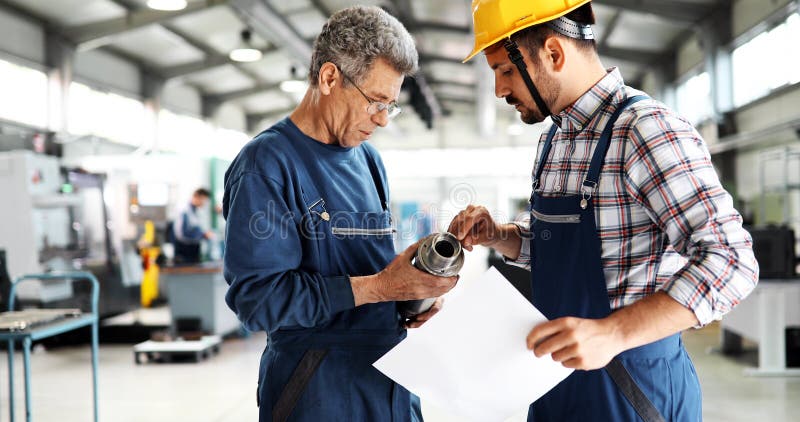 Discussion on Factory Floor Stock Photo - Image of inspector ...