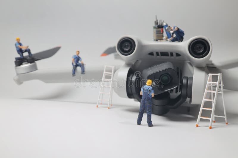 Team of Engineers Inspects the Engines of a Drone Stock Photo - Image ...
