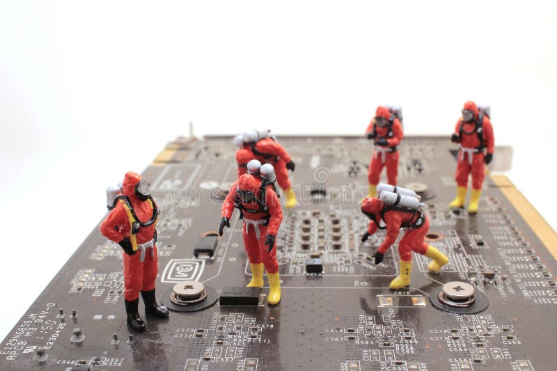 A Team of Engineers Repairing Circuit Board. Computer Repair Concept ...