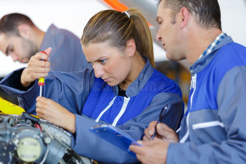 Team Engineers with Screwdriver and Screws Stock Image - Image of ...