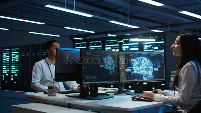 Team of Engineers Using AI Tech on Computer To Do Checkup in Server ...