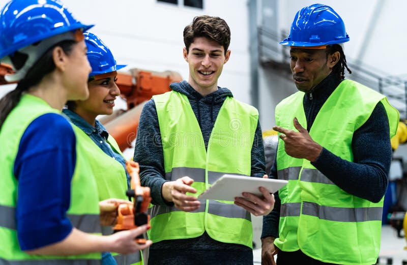Team of Engineers Working in Robotic Factory Stock Photo - Image of ...