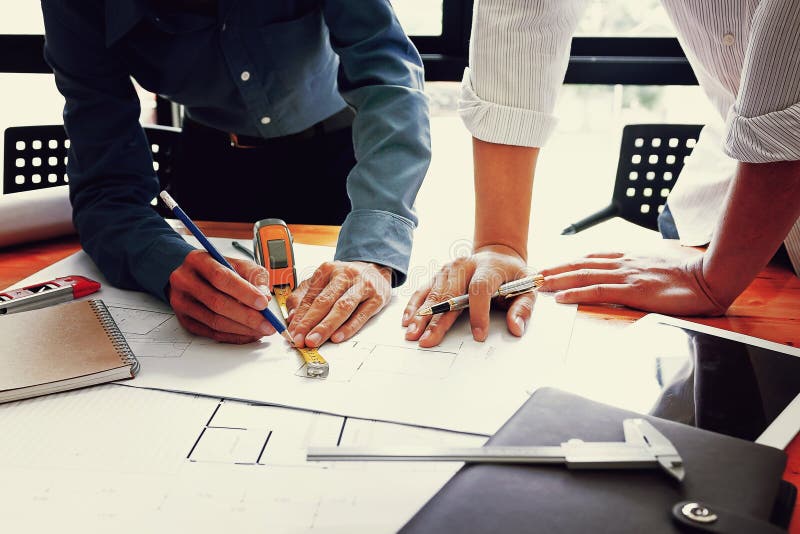 Team of Engineers Working Together. Stock Image - Image of ...