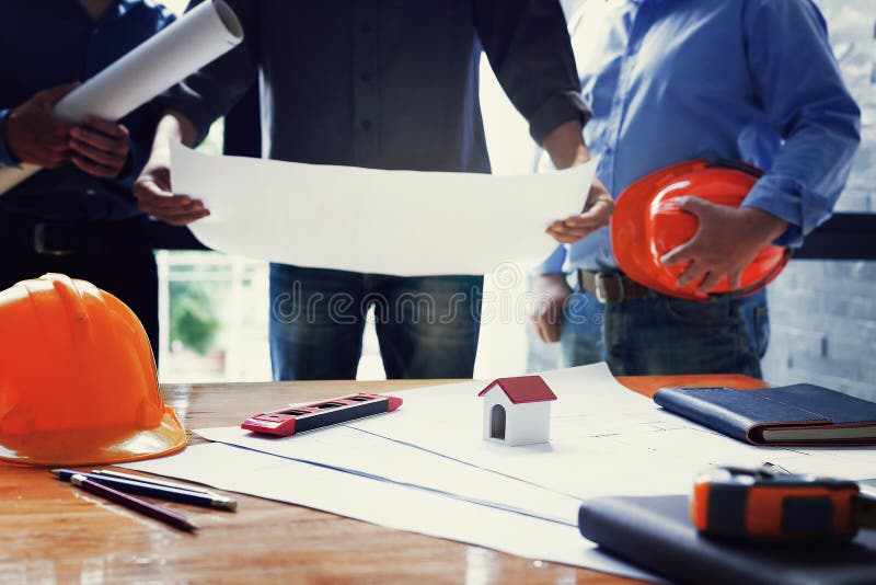 Team of Engineers Working Together. Stock Photo - Image of ...