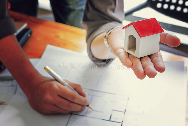 Team of Engineers Working Together. Stock Photo - Image of layout ...