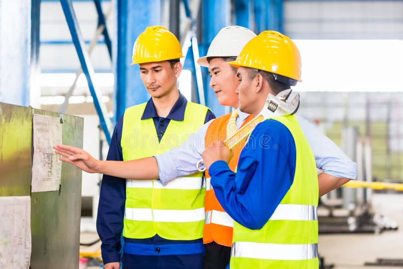 Team in Factory at Production Training Stock Image - Image of hardhat ...