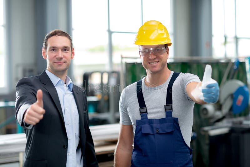 Team in Factory with Thumbs Up Stock Image - Image of manufacturing ...