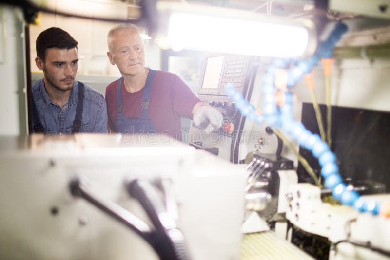 Factory Workers Working in Team Stock Photo - Image of control, machine ...