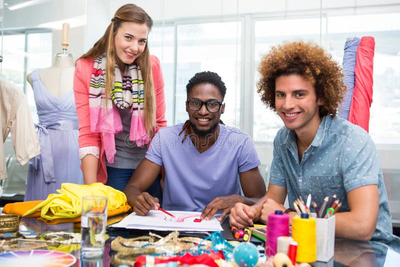 Team of Fashion Designers Sketching Stock Image - Image of cool, adult ...