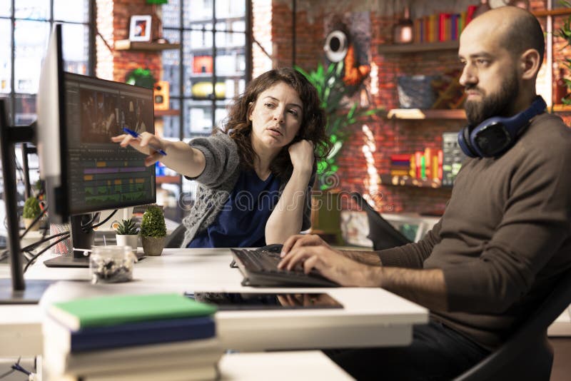 Team of Filmmakers Specialists Work on a Professional Video Shoot Stock ...