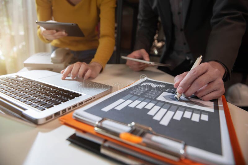 Team or Financial Data Analysts Working with Tablets and Laptop ...