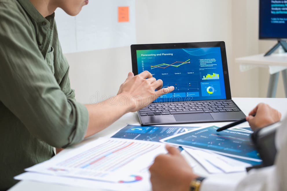 Team of Financial Discussion Business Planning, Analyzing Digital ...