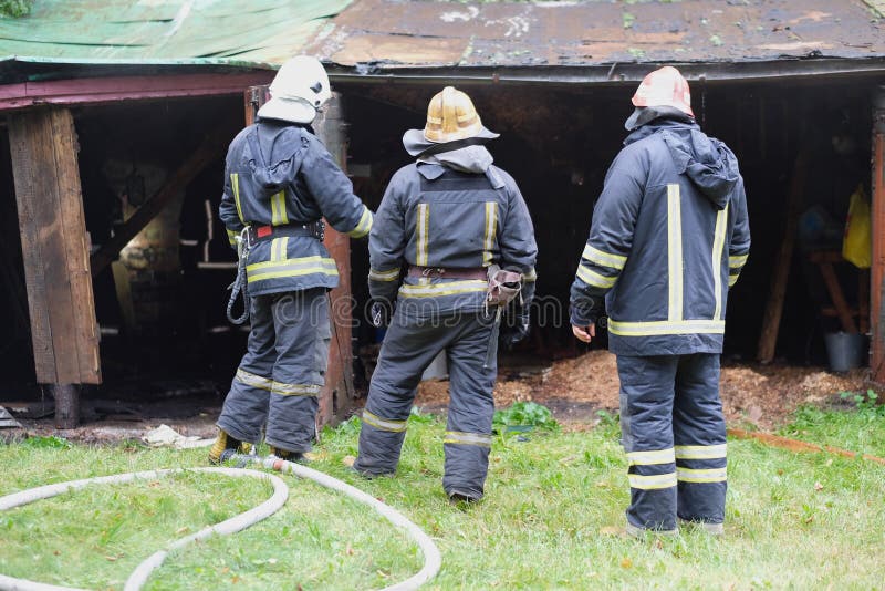 Fire brigade after work editorial photo. Image of helmets - 102163116
