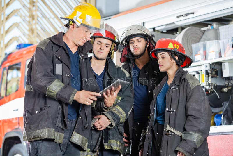 Team of Firefighters Using Digital Tablet Stock Image - Image of ...
