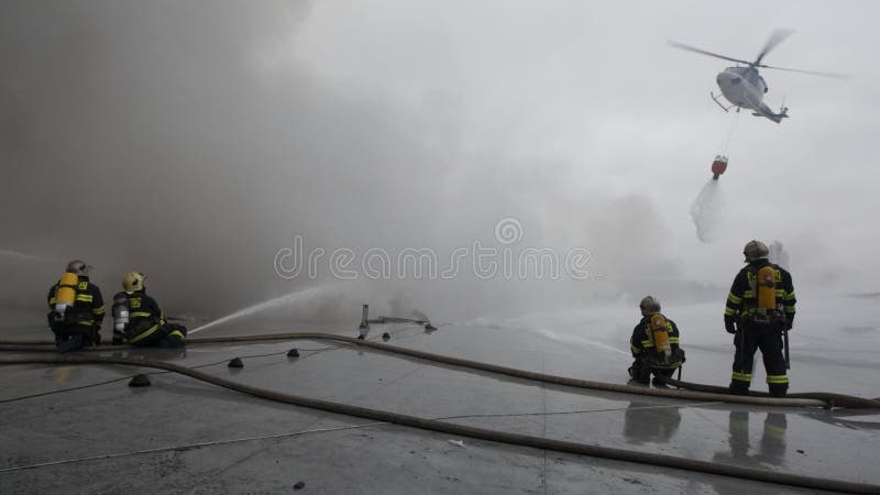 Firefighter in action stock image. Image of danger, voorhout - 19487193