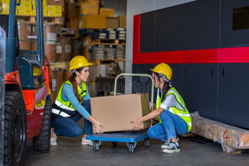 Team Foreman or Team Worker Working in Warehouse. Industrial and ... Team Foreman or Team Worker Working in Warehouse. Industrial and ...