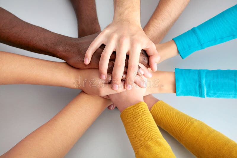Hands joined in unity stock photo. Image of gathering - 40993936