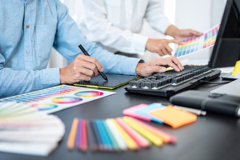 Team Graphic Designer Working on Document of Color Chart To ...