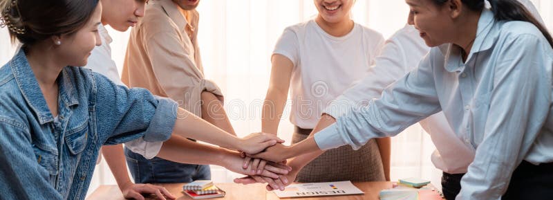 Team of Graphic Designers Building Unity and Solidarity. Scrutinize ...