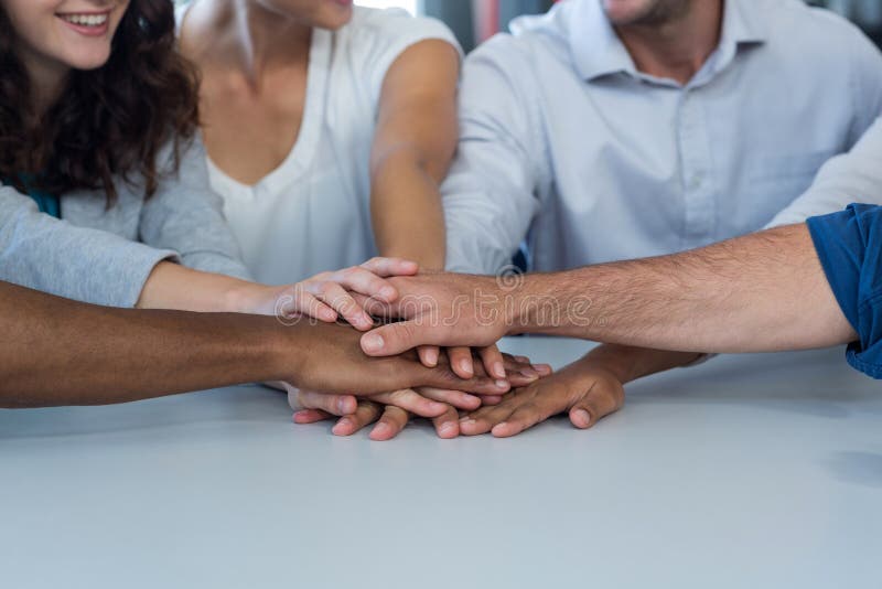Team of Graphic Designers Forming Handstack Stock Image - Image of ...