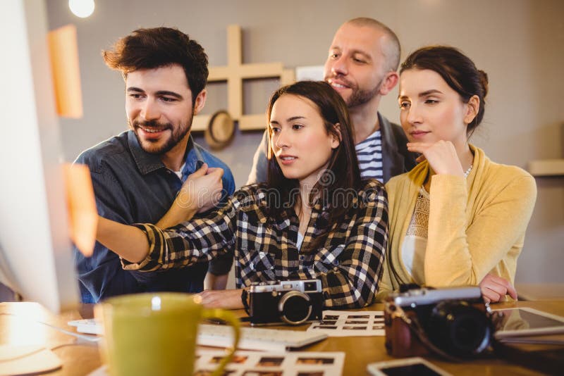Team of Graphic Designers Working on a Computer Stock Photo - Image of ...